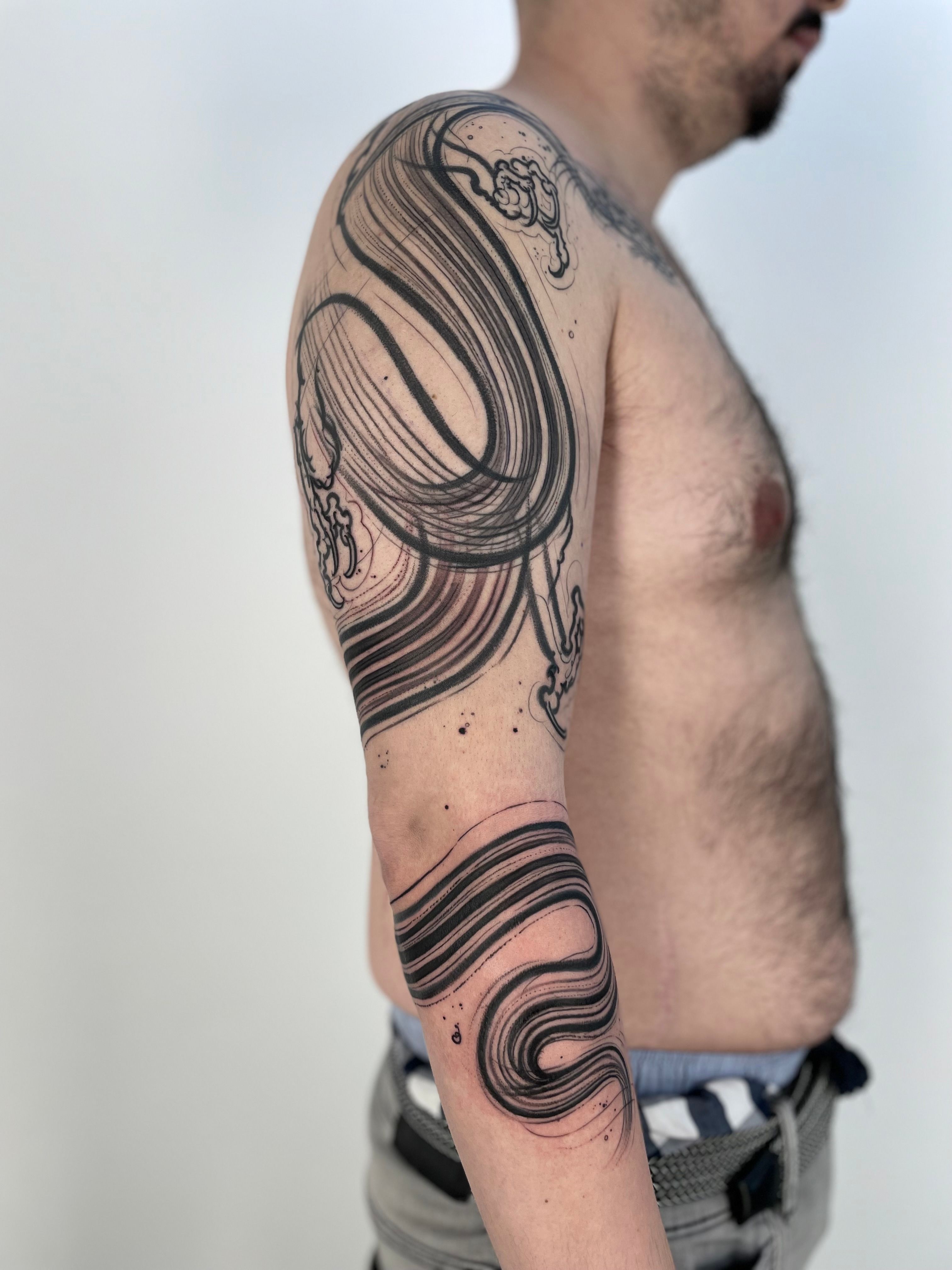 Abstract Dragon Lines Tattoo • Tattoodo