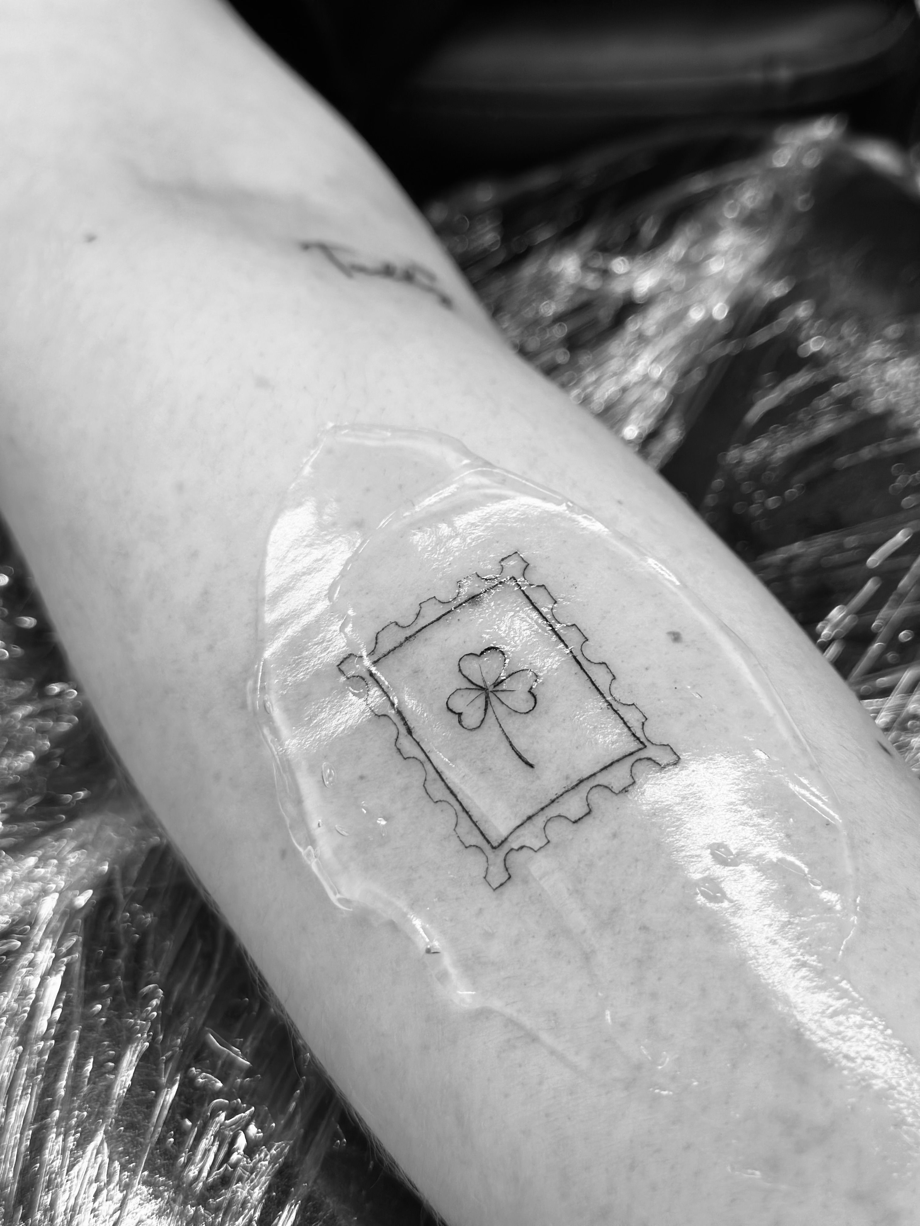 Fine Line Stamp and Clover Tattoo • Tattoodo