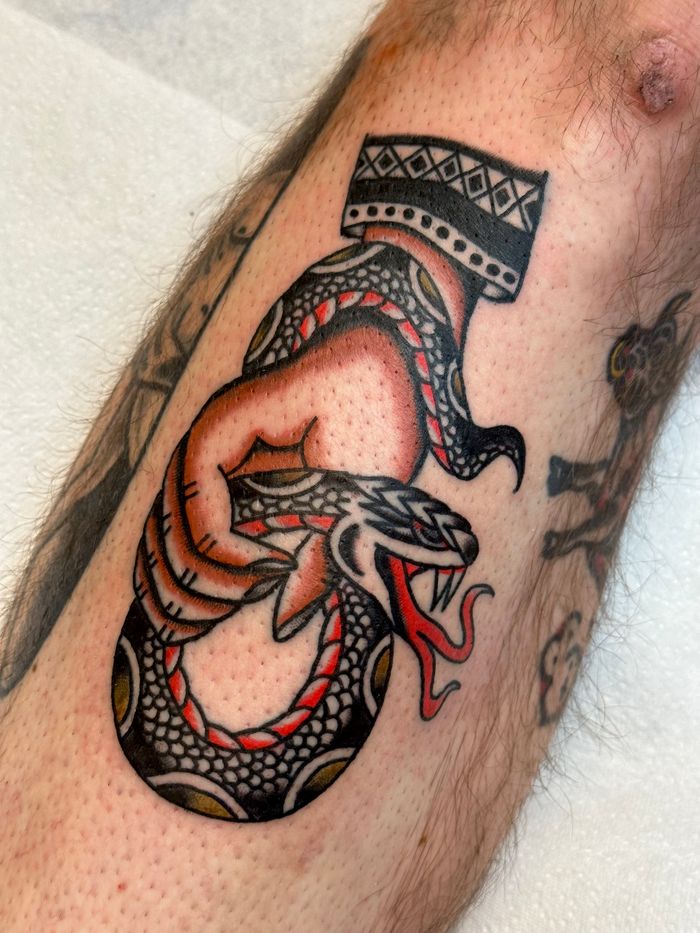 Traditional Snake Hand Tattoo • Tattoodo