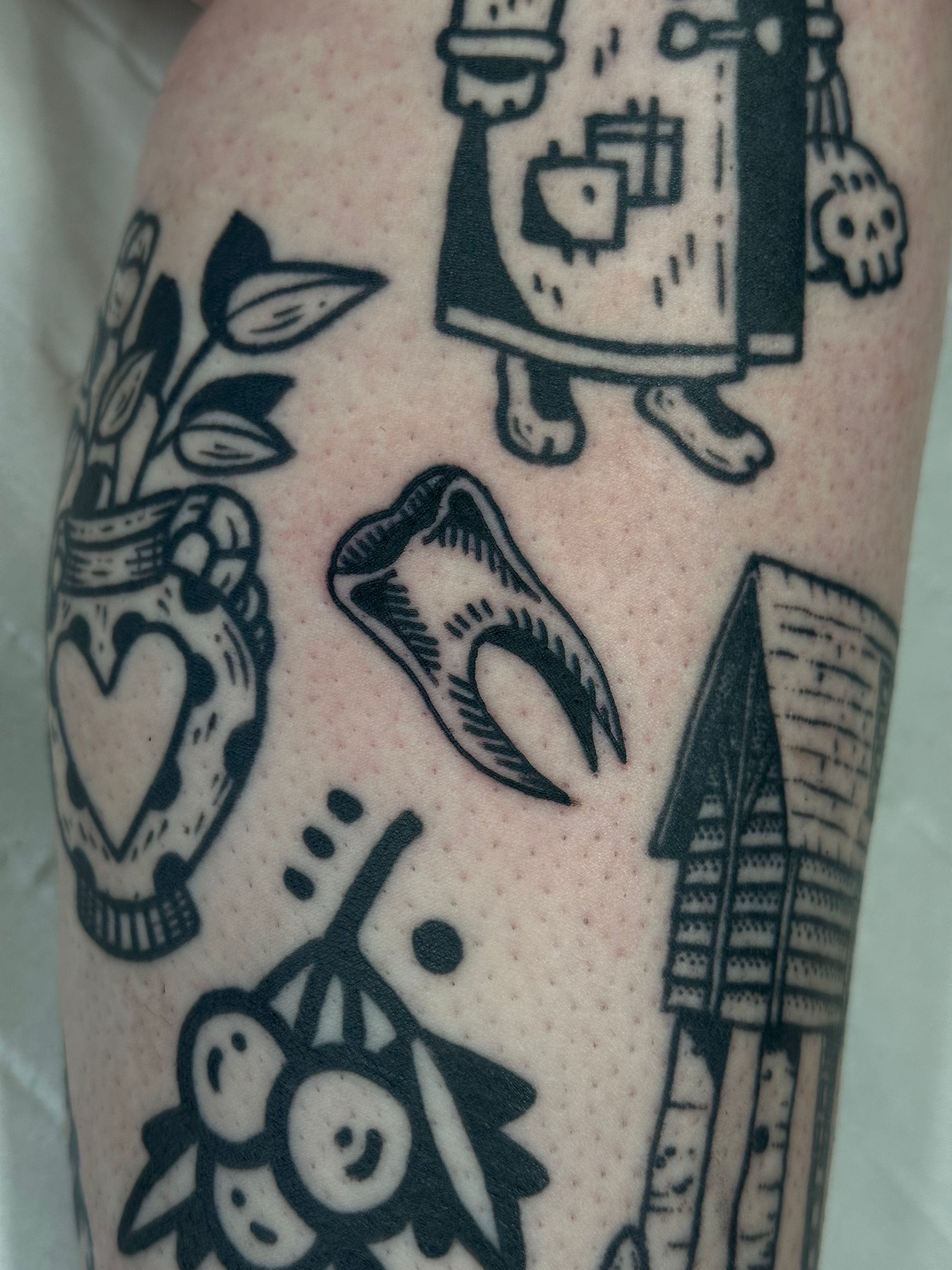 Traditional Tooth Tattoo by Jakob Isaac • Tattoodo