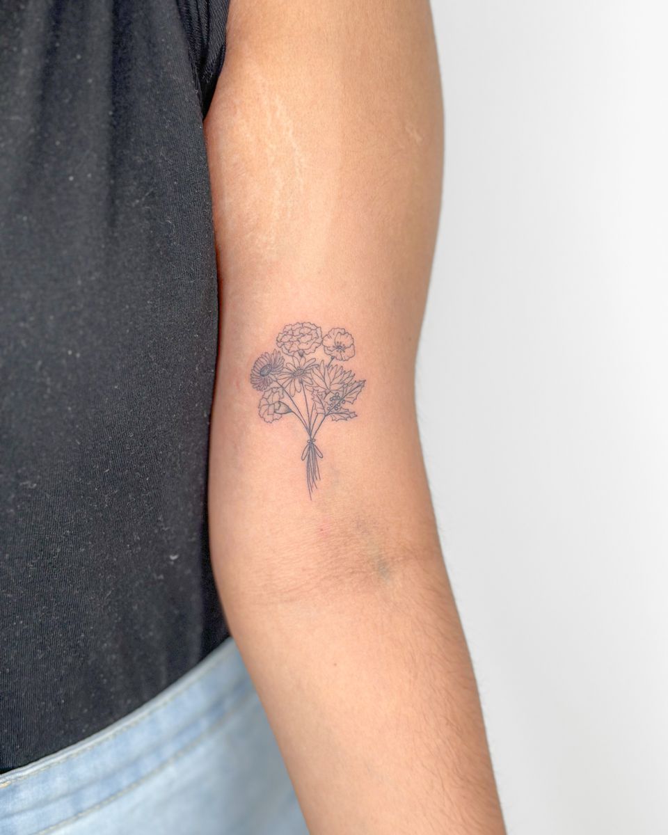 Delicate Flower Bundle Tattoo by Bradley Mollett • Tattoo uploaded by ...