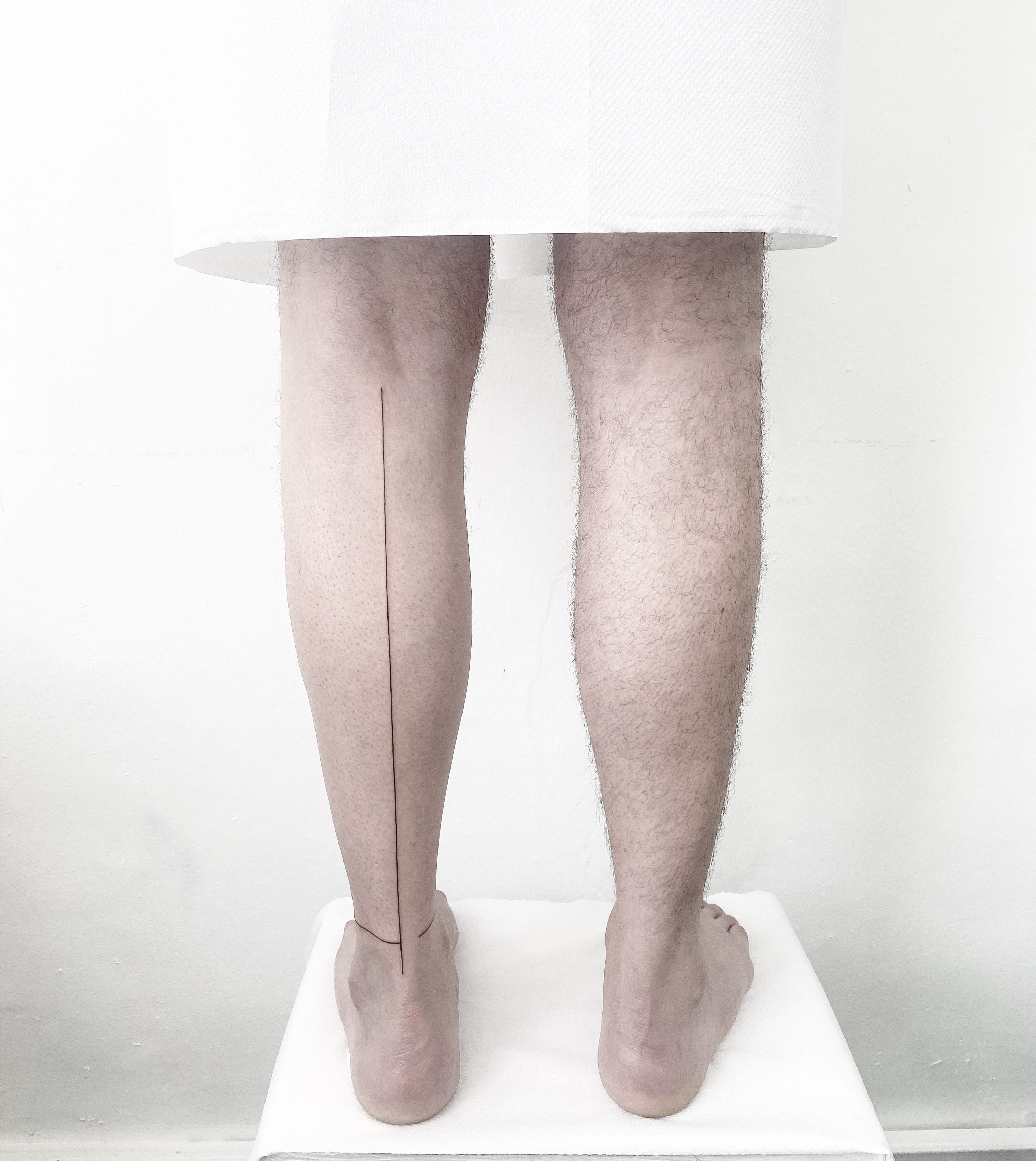 Vertical Leg Line • Tattoodo