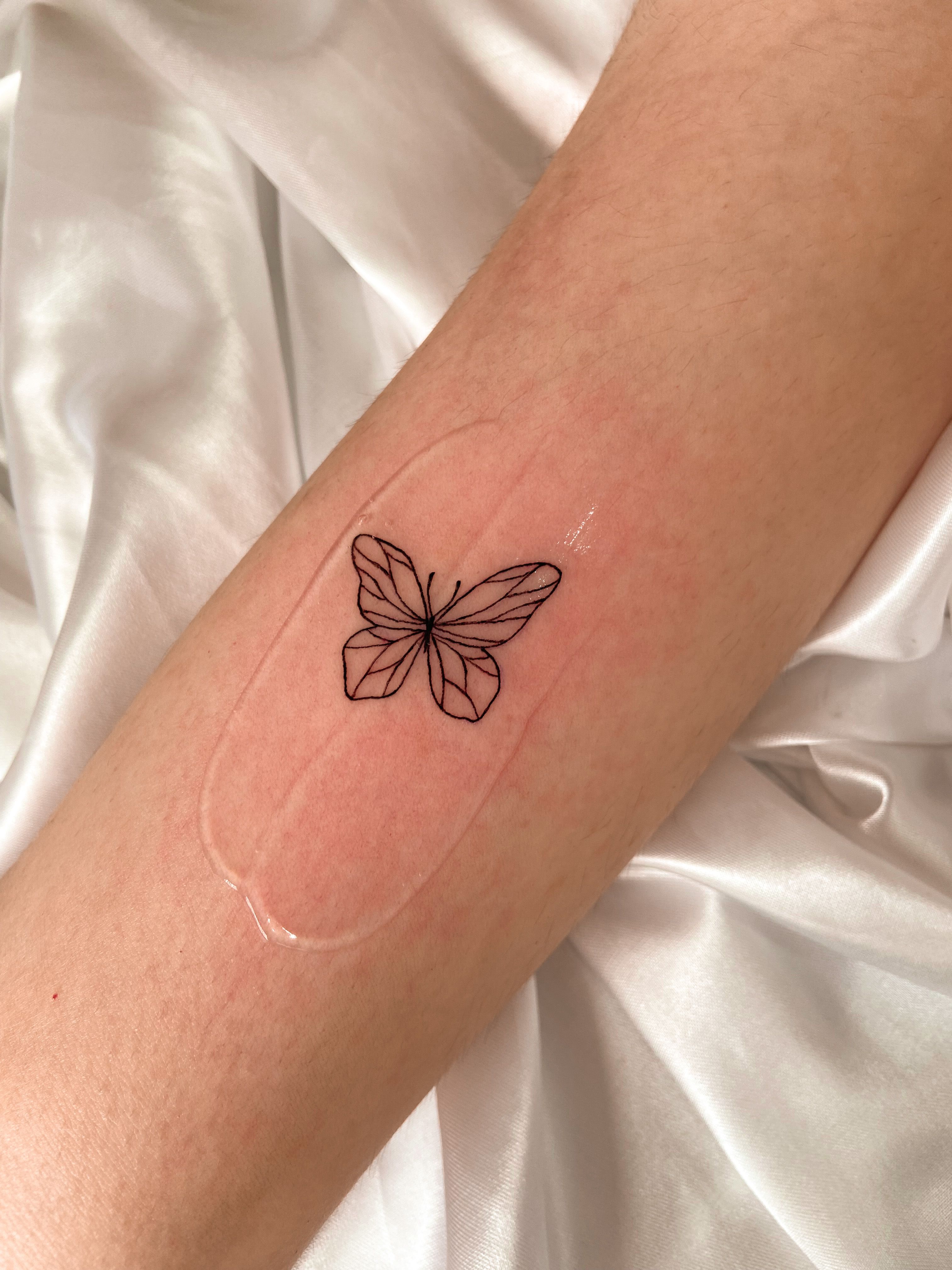 Minimalist butterfly outline tattoo - Bronctattooaus.com