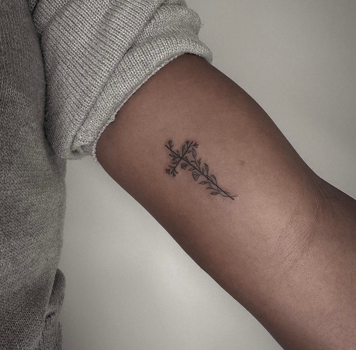 Fine Line Flower and Cross Tattoo • Tattoodo