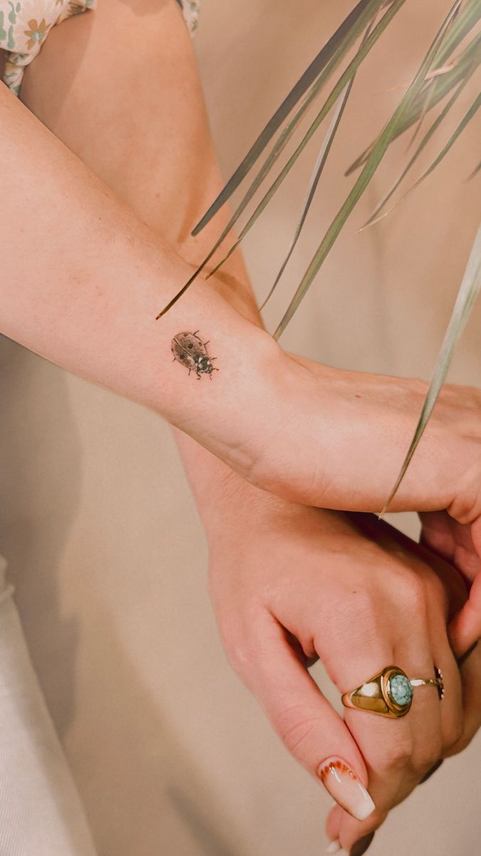 Tattoo uploaded by Milky Blue • tiny micro-realistic ladybird on the ...