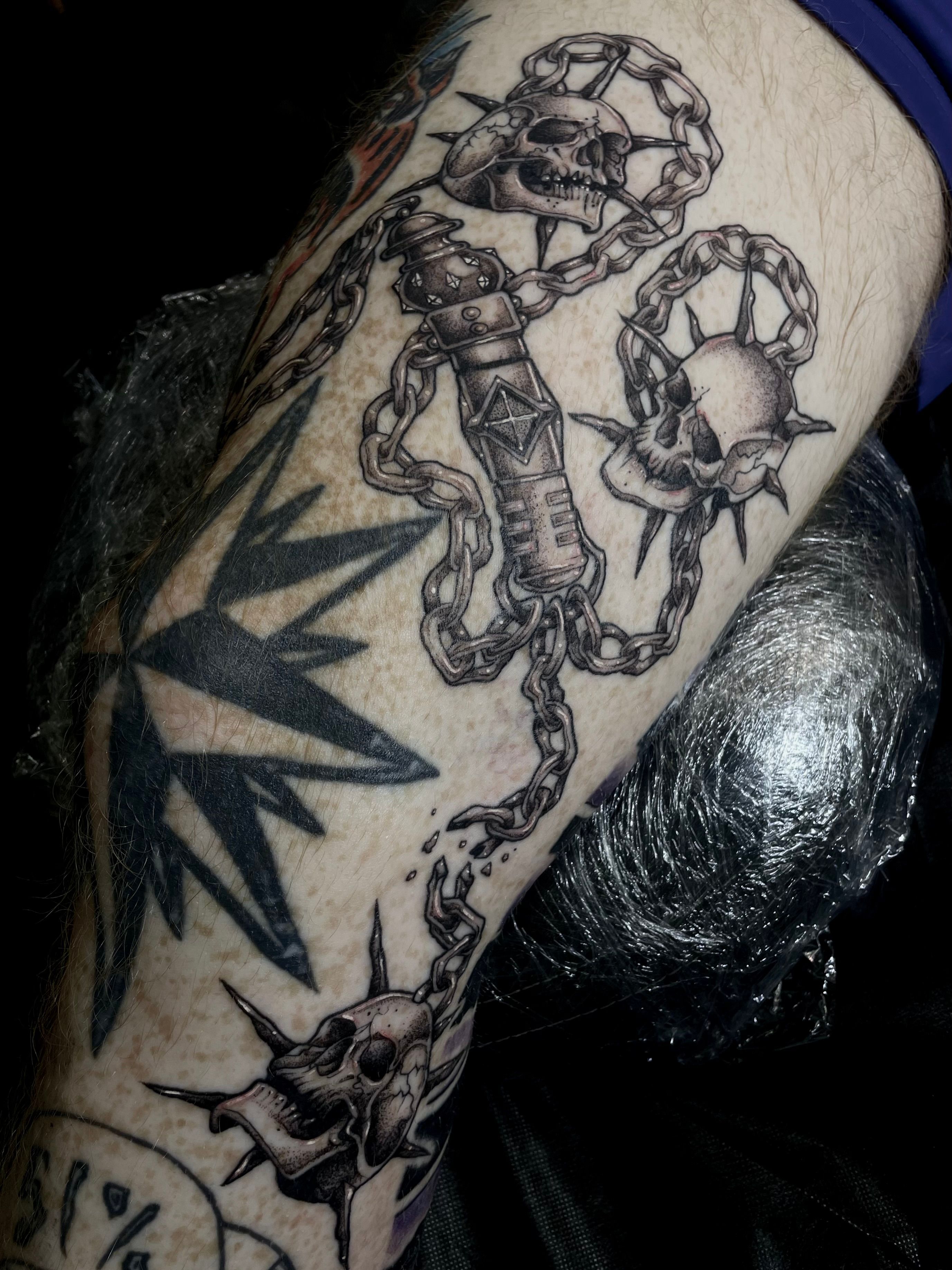 Illustrative Skull and Weapon Tattoo • Tattoodo