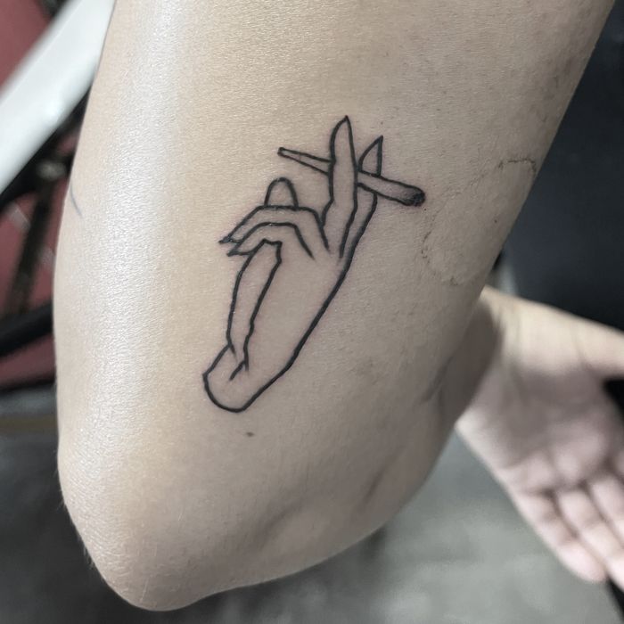 Hand Holding Cigarette Tattoo • Tattoodo