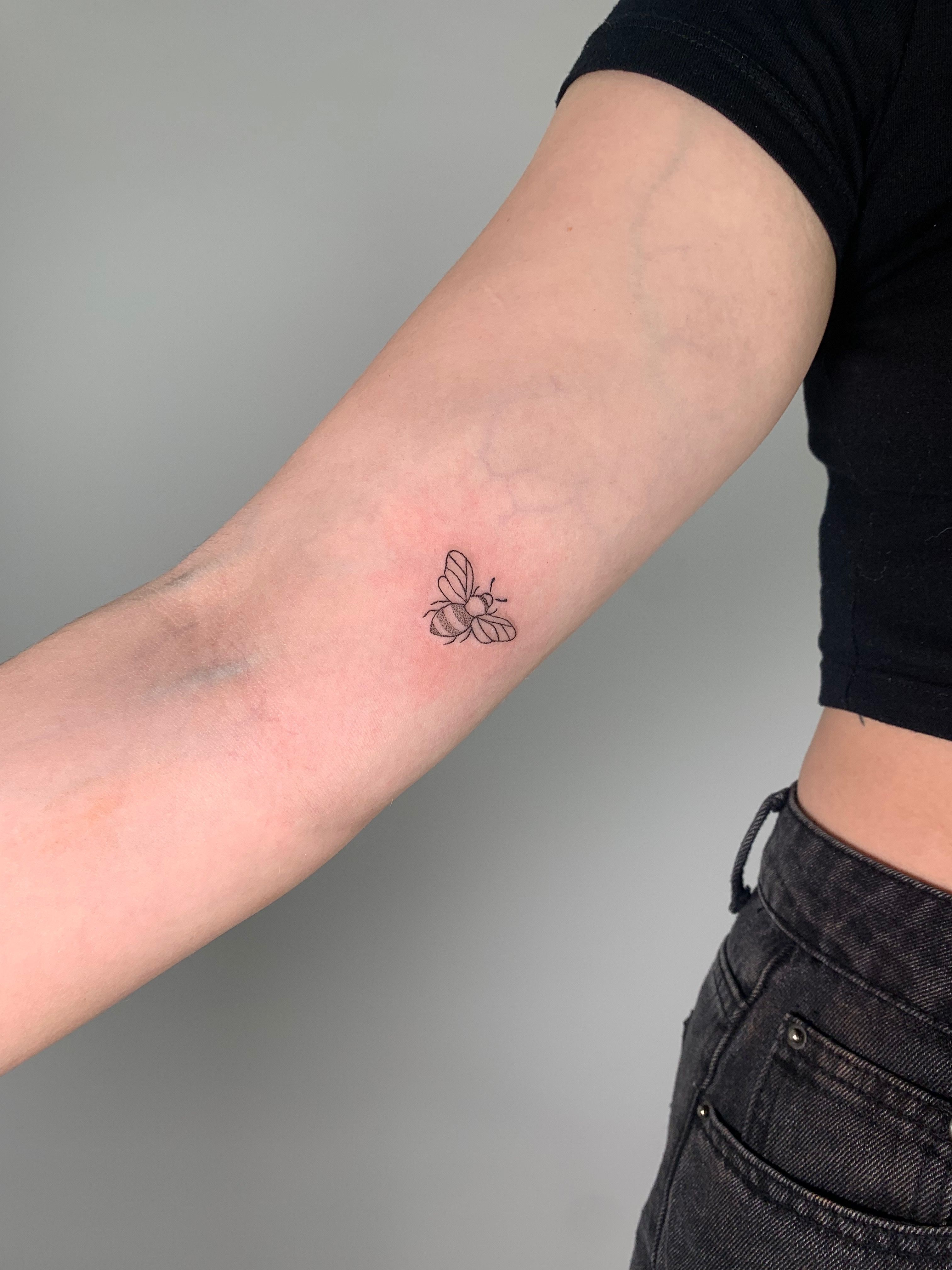 Delicate Fine Line Bee Tattoo • Tattoodo