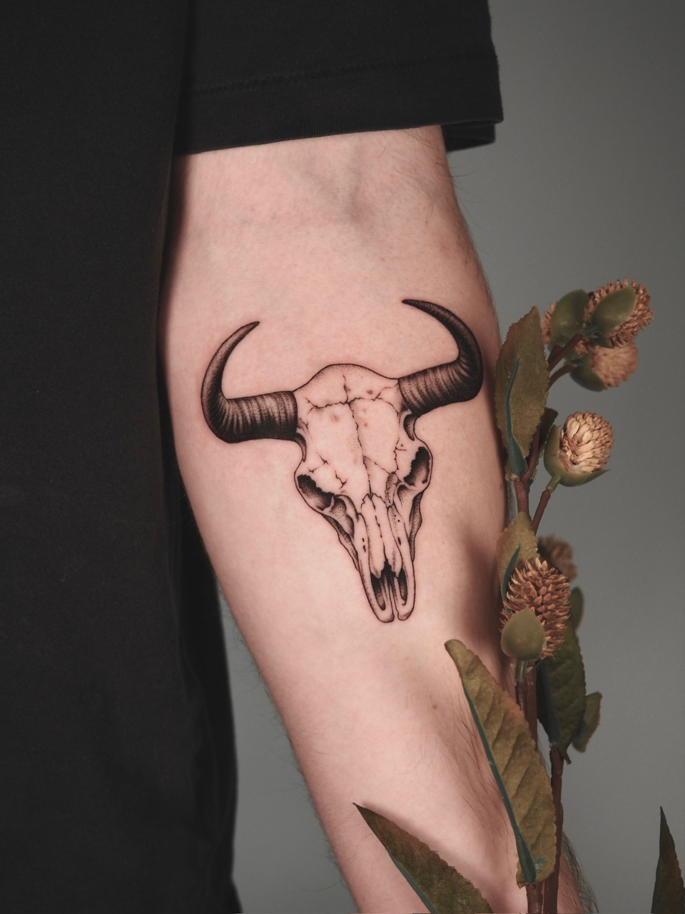 Bull Skull With Feathers Tattoo Meaning