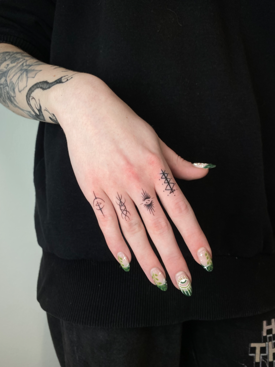 Sad Finger Tattoos