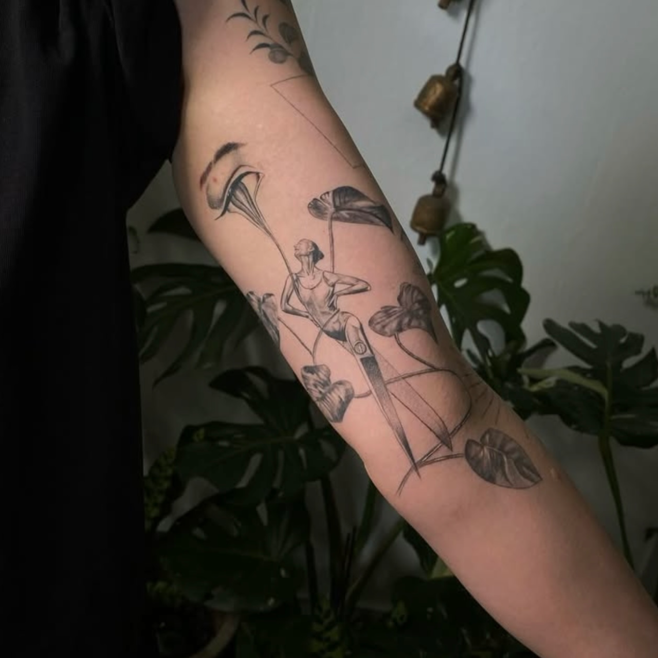 Flower and Figure Tattoo • Tattoodo