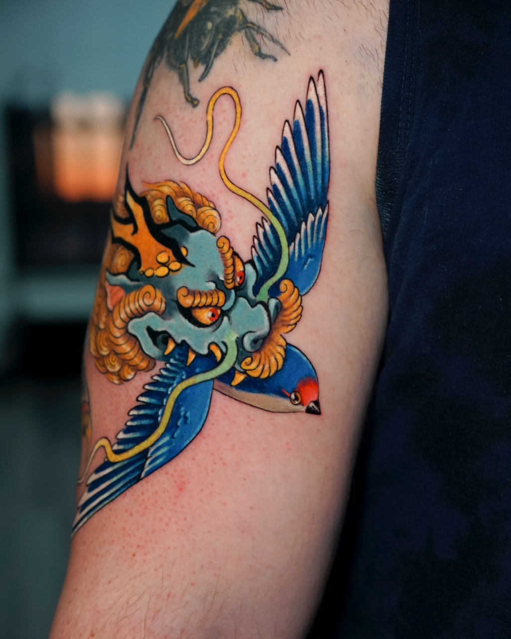 Mythical Creature with Bird Tattoo • Tattoodo
