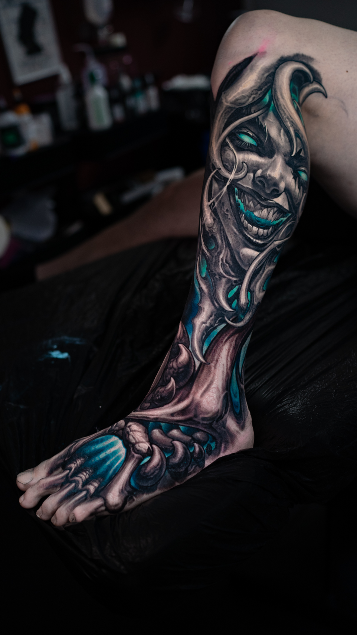 Distorted Face Foot Tattoo • Tattoodo