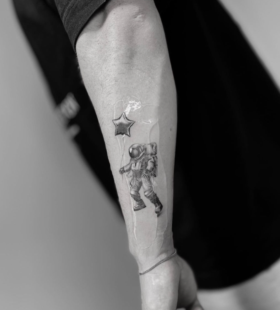 Micro Realism Astronaut & Balloon Tattoo • Tattoodo