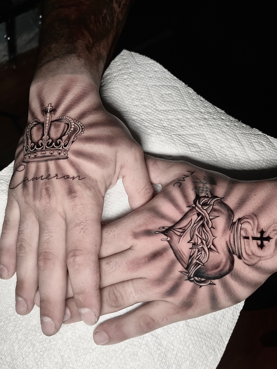 Sacred Heart and Crown Hand Tattoos • Tattoodo