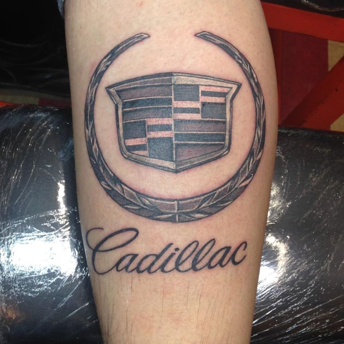 Tattoo uploaded by Ross Howerton • A black and grey Cadillac insignia ...