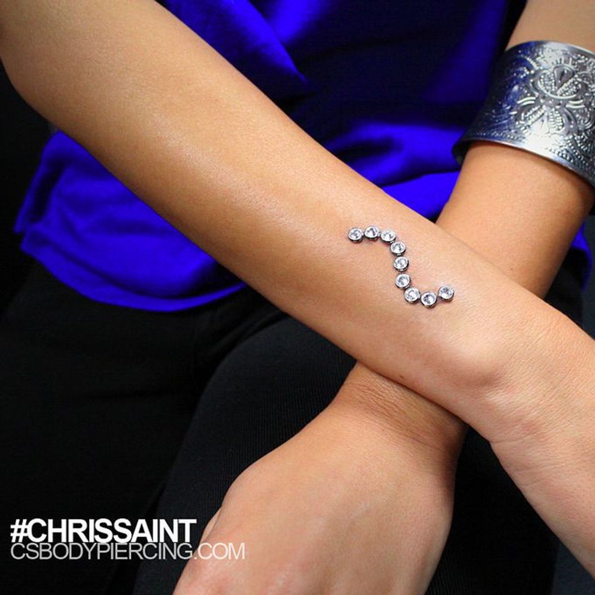 Tattoo uploaded by minerva • Pretty arm piercing by Chris Saint # ...