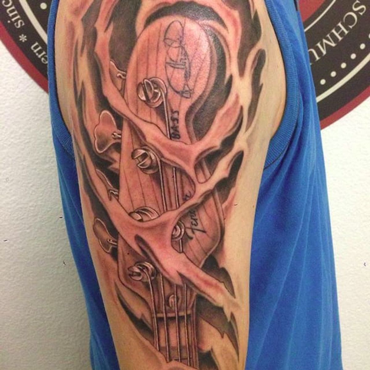 Tattoo uploaded by Servo Jefferson • Ripped skin Fender bass head by ...