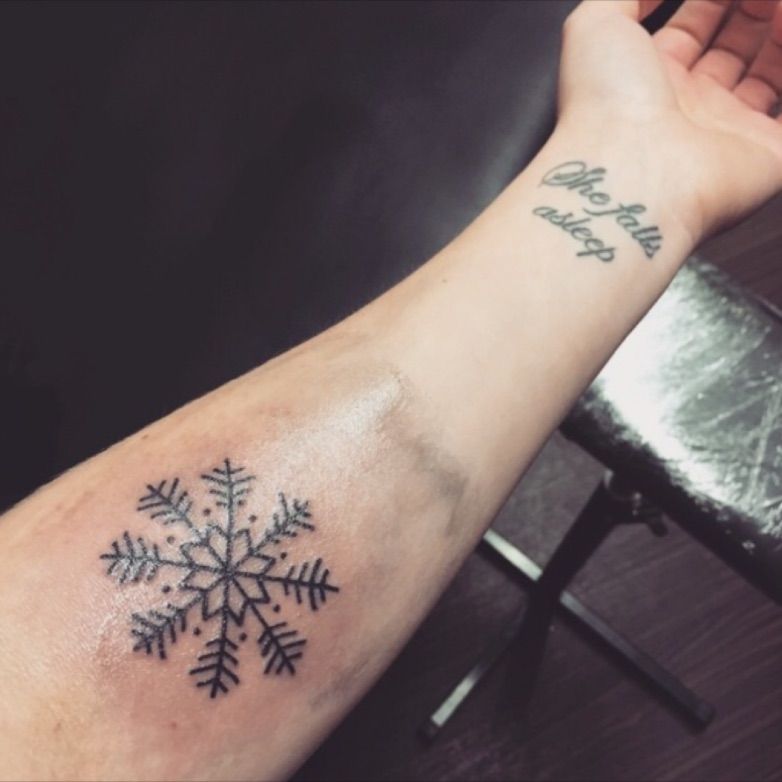 Snowflake Arm Tattoo