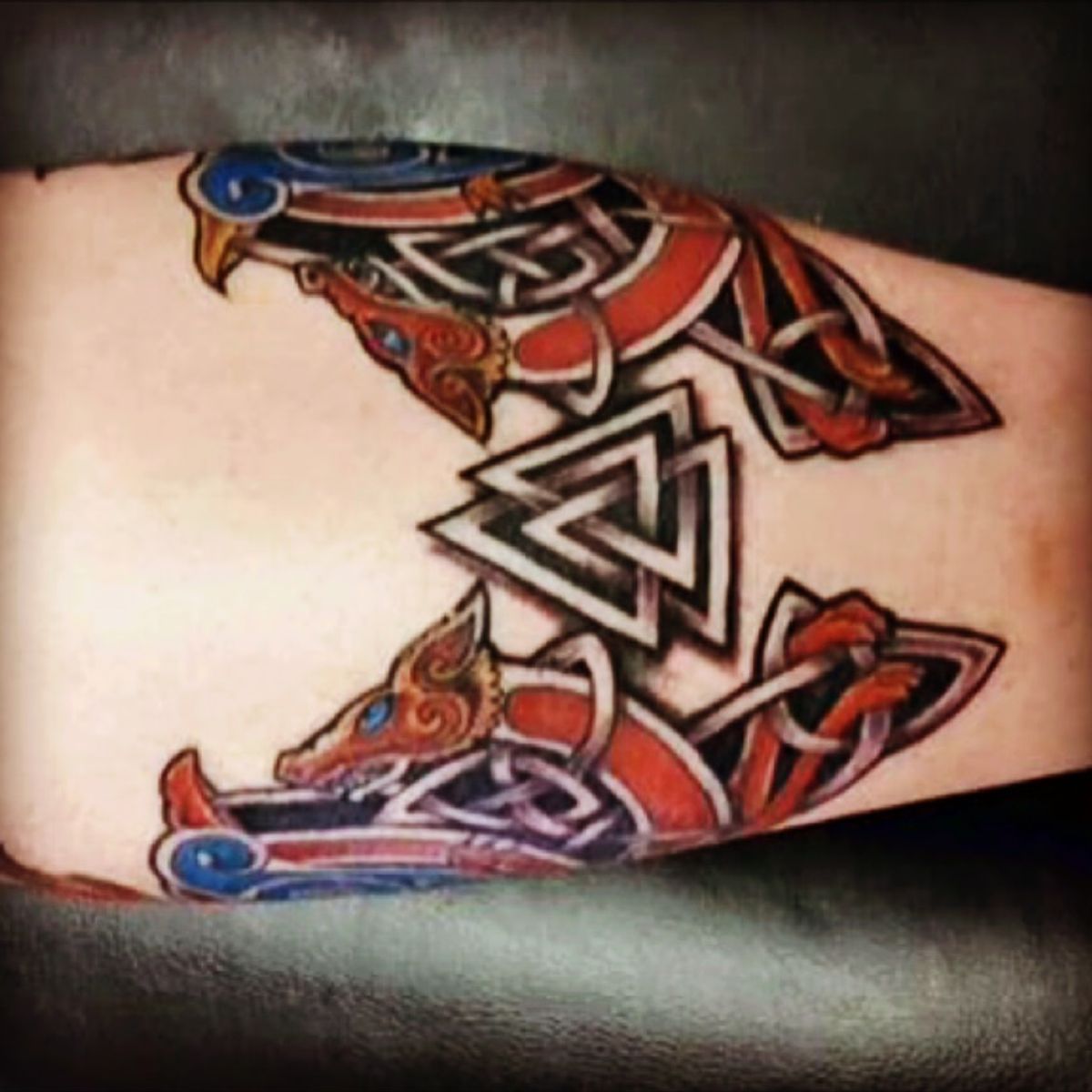 Tattoo uploaded by Michael Smith • Odins valknott with stylised crows and wolves. • Tattoodo