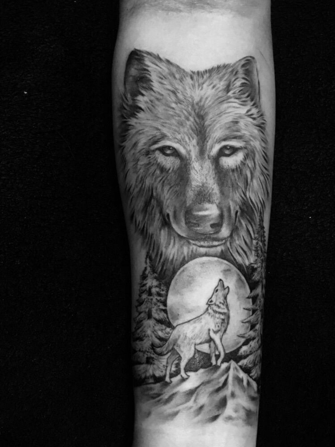 wolf moon tattoo arm